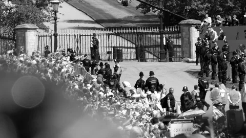 Crowd saluting welcomes the Royal Weddin... | Stock Video | Pond5