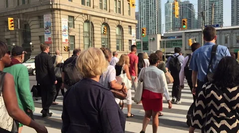 Crowd of Toronto city commuters walk acr... | Stock Video | Pond5
