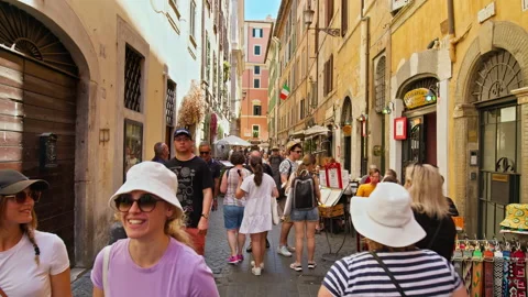A crowd of tourists walking in Rome arou... | Stock Video | Pond5