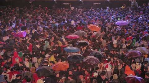crowd under the rain watching rock conce... | Stock Video | Pond5
