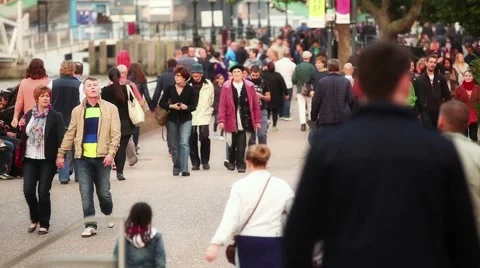 Crowd walking on Thames pavement in Lond... | Stock Video | Pond5