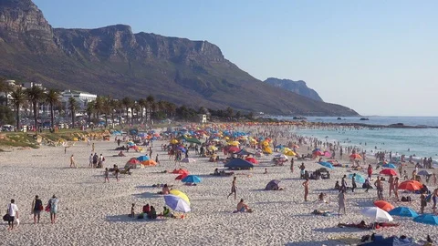 A crowded and busy holiday beach scene a... | Stock Video | Pond5