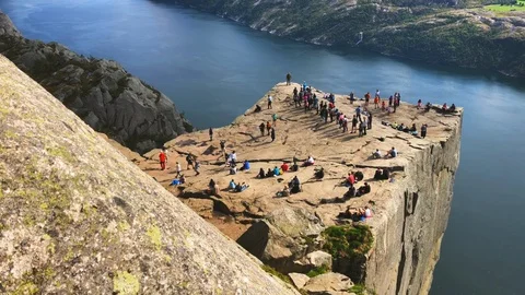 Crowded cliff edge of Preikestolen Pulpi... | Stock Video | Pond5