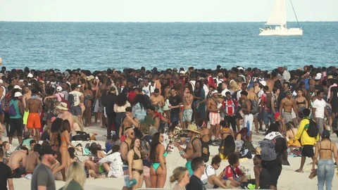 Crowded Miami Beach at spring break time... | Stock Video | Pond5