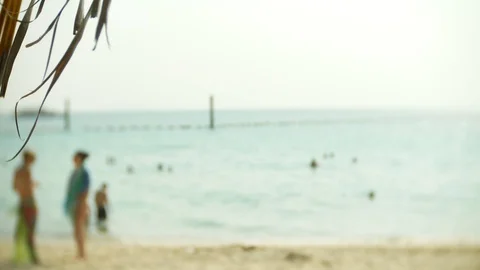 Crowded sand beach scene with unrecogniz... | Stock Video | Pond5