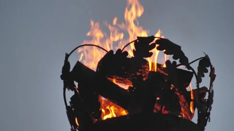Crown on a pillar with fire. Midsummer b... | Stock Video | Pond5