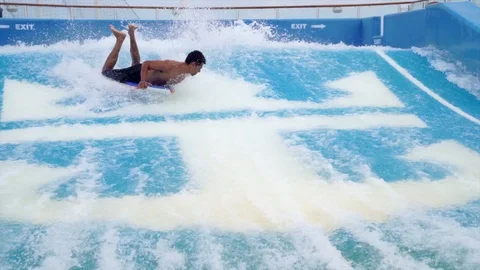 Cruise ship flowrider surf simulator poo... | Stock Video | Pond5