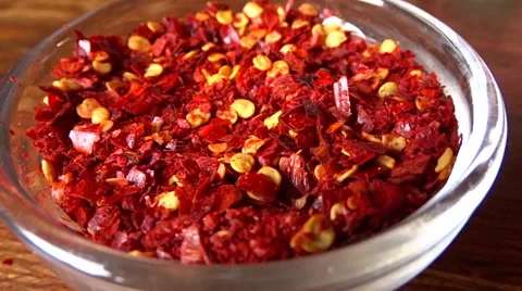 Crushed Red Chilli Pepper flakes create ... | Stock Video | Pond5