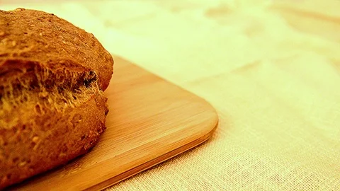 crusty farmhouse bread with camera drive | Stock Video | Pond5