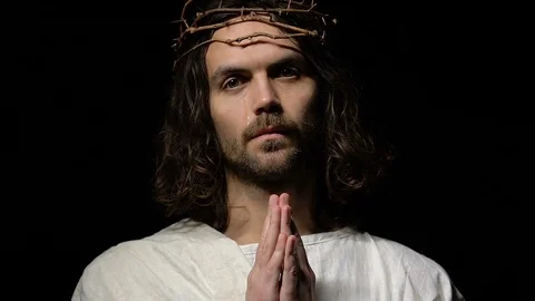Crying Jesus Christ in crown of thorns p... | Stock Video | Pond5