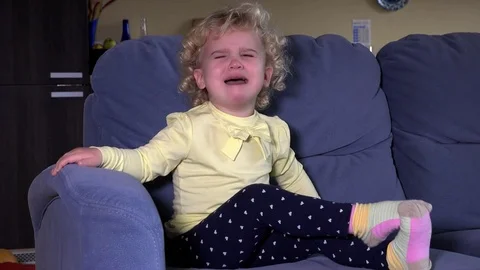 Crying little child girl get tablet comp... | Stock Video | Pond5