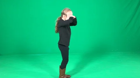 CRYING LITTLE GIRL SIDE VIEW GREENSCREEN | Stock Video | Pond5