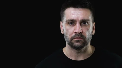 Crying man putting gun to temple against... | Stock Video | Pond5