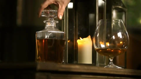 Crystal brandy decanter set with glass a... | Stock Video | Pond5