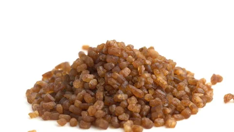 Crystal caramel falling on the pile on w... | Stock Video | Pond5