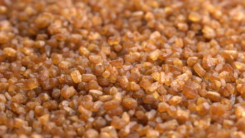 Crystal caramel falling on the rotation ... | Stock Video | Pond5