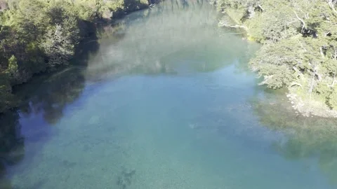 Crystal clear blue river, Rio Arrayanes,... | Stock Video | Pond5