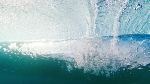 Crystal clear wave breaks in the ocean o... | Stock Video | Pond5