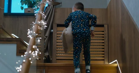 CU Cute little kid boy running upstairs ... | Stock Video | Pond5