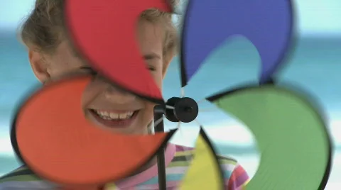 CU OF A GIRL SPINNING A PIN WHEEL | Stock Video | Pond5