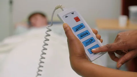CU Nurse Using Hospital Bed Remote Contr... | Stock Video | Pond5