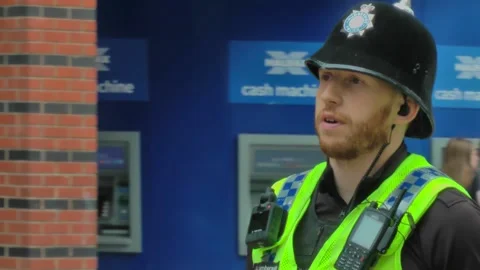 CU UK police officer, patrolling city st... | Stock Video | Pond5