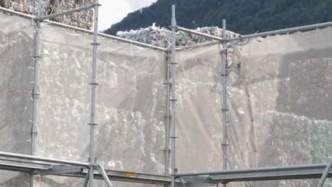 Cubes of compressed plastic garbage at a... | Stock Video | Pond5