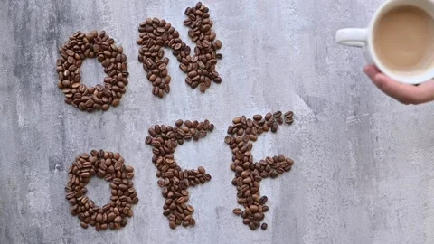 cup of coffee as a switch between ON and... | Stock Video | Pond5
