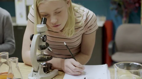 Curious junior high girl student using m... | Stock Video | Pond5