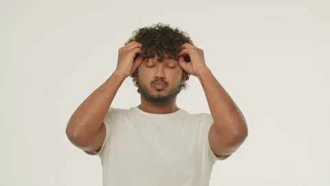 Curly young man showing mind explosion g... | Stock Video | Pond5