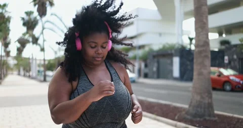 Curvy woman running outdoor - Plus size ... | Stock Video | Pond5