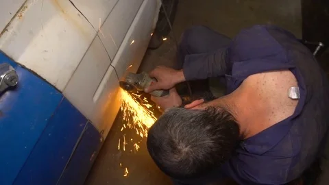 Custom carmaker makes car body cutting | Stock Video | Pond5