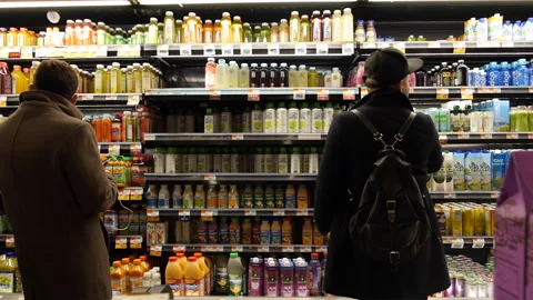 Customers Shop in the Juice Aisle at Gro... | Stock Video | Pond5