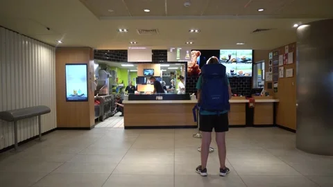 Customers waiting at McDonalds counter F... | Stock Video | Pond5