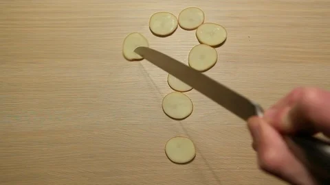 cut potato knife question mark table hd ... | Stock Video | Pond5