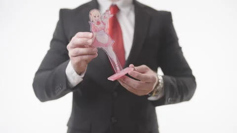 Cute anime maid figure in hands of suite... | Stock Video | Pond5