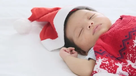 Cute baby child sleeping on the bed. | Stock Video | Pond5
