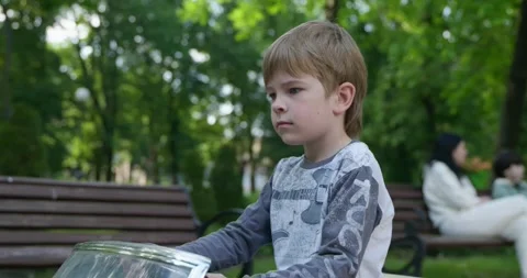 Cute Boy Drives Electric Red Car. Kid Ch... | Stock Video | Pond5