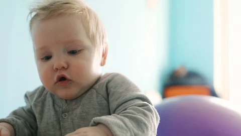 Cute caucasian 10 months 1 year old baby... | Stock Video | Pond5