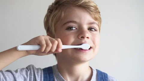 Cute child brush teeth toothbrush, smili... | Stock Video | Pond5