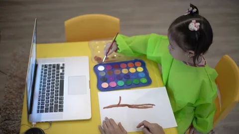 cute child learning to draw a tree using... | Stock Video | Pond5