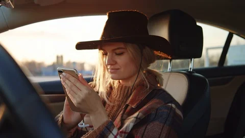 Cute cowboy girl using smartphone for co... | Stock Video | Pond5