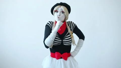 Cute female mime shushing touching lips ... | Stock Video | Pond5