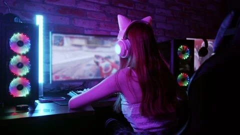 Cute gamer girl playing shooter - turns ... | Stock Video | Pond5