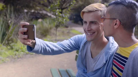 Cute Gay Couple Pose/Kiss On Cheek For A... | Stock Video | Pond5