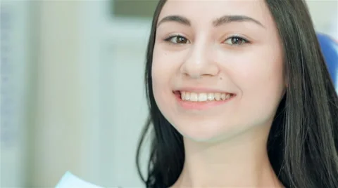 Cute girl teeth smile looking at camera | Stock Video | Pond5