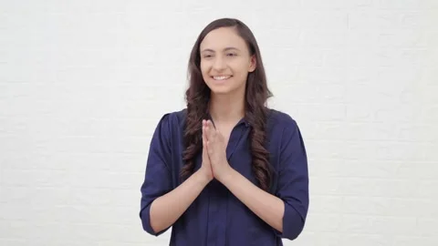 Cute Indian girl doing Namaste | Stock Video | Pond5