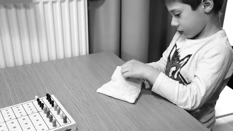 Cute Kids playing wooden Mastermind game... | Stock Video | Pond5