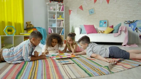 Cute Kids Talking and Drawing Poster on ... | Stock Video | Pond5