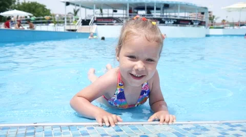 Cute little child girl have fun swim in ... | Stock Video | Pond5